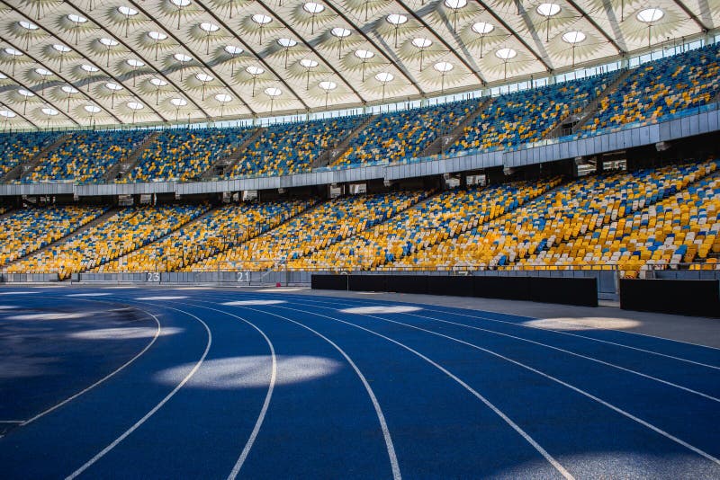 Empty Blue Running Track at the Olympic Stadium Stock Image - Image of ...