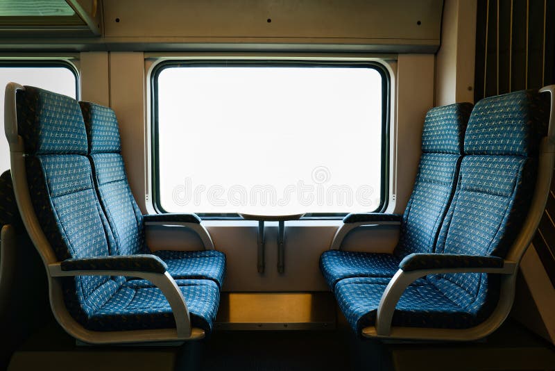 Empty Blue Seats in Passenger Train with Bright Window. Stock Photo ...