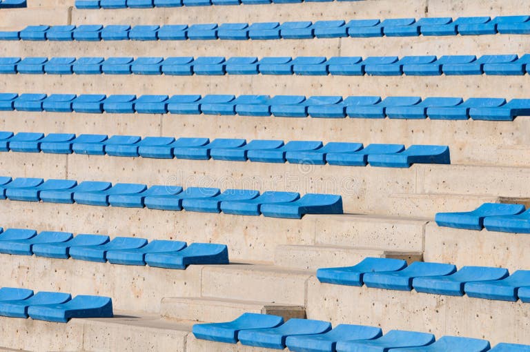 Empty Blue Stadium Seats Creating a Repetitive Pattern Stock Photo ...