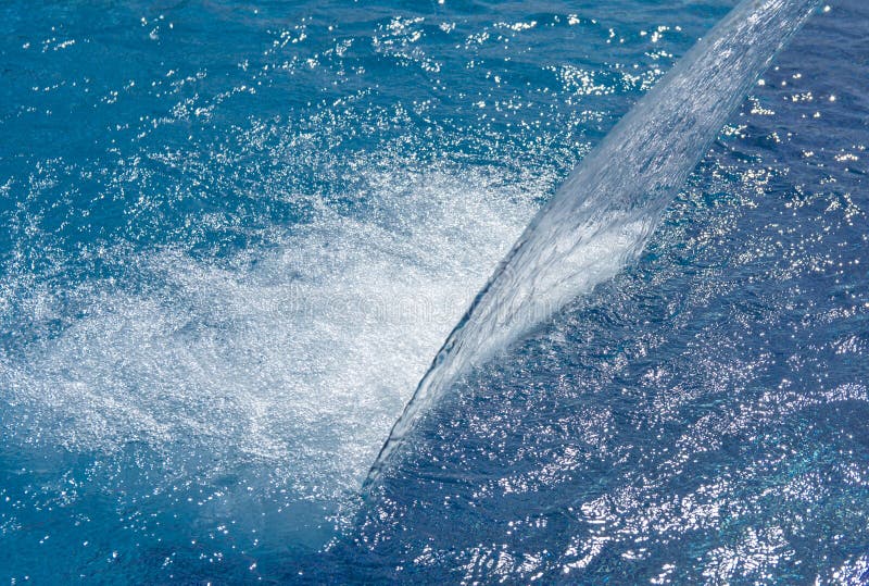 Empty Blue Water Pool with a Waterfall Stream in Action. Relaxation ...