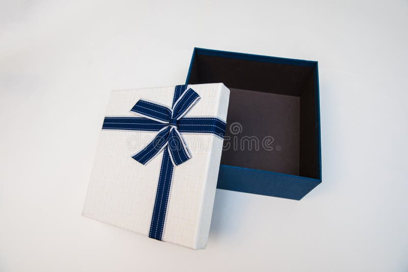 Empty Blue and White Gift Packaging on a White Background Stock Image ...