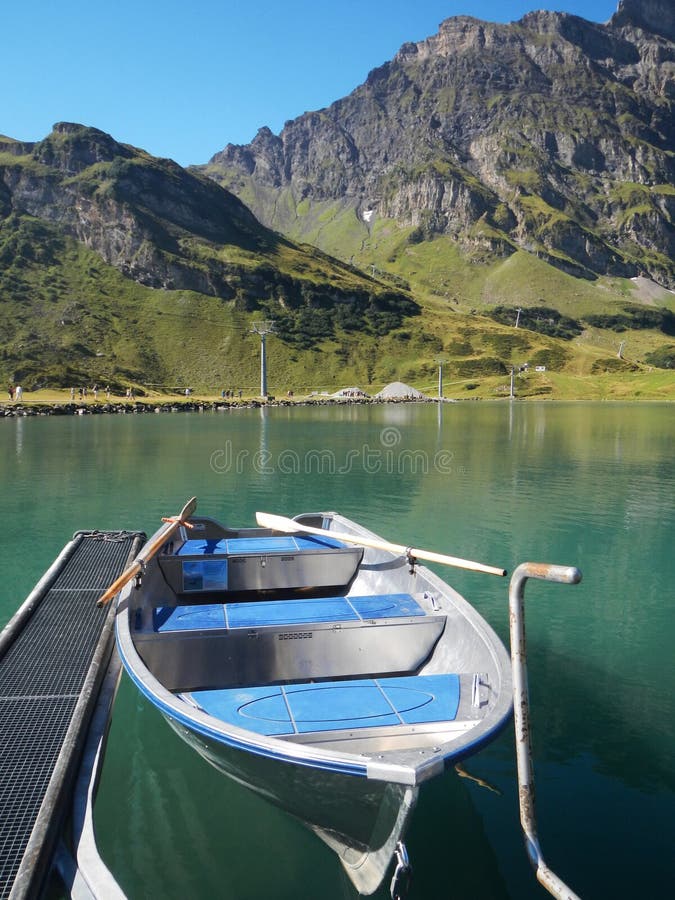 Empty Boat in Lake Truebsee Stock Photo - Image of nautical, jetty ...