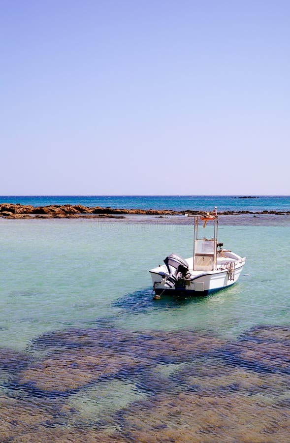 An empty boat in the sea stock image. Image of crete - 34428641