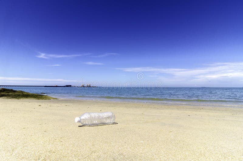 Empty bottle and beach stock image. Image of empty, holiday - 54879093