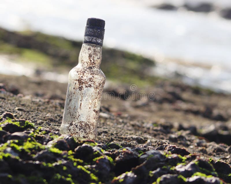 Empty Bottle on the Beach Side Stock Image - Image of glass, empty ...