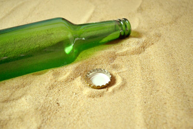 Empty Bottle with Cap Left on the Beach Stock Photo - Image of green ...
