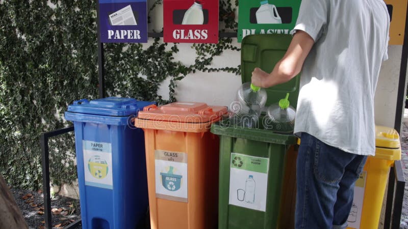 Empty Bottle. Plastic Garbage Bin Trash Container. Hand Bottle into ...