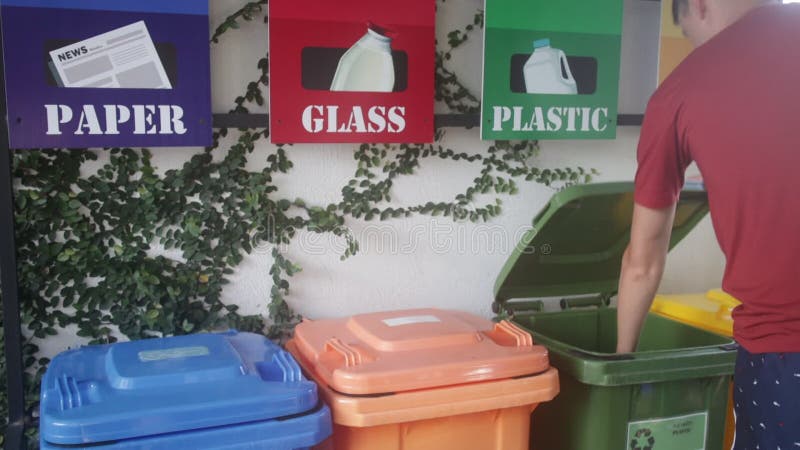 A Man Throws Out Garbage, Sorts Plastic Stock Footage - Video of ...