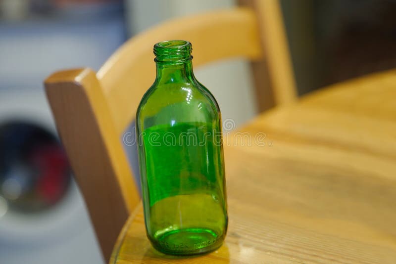Empty bottle on table stock image. Image of table, bottle - 81409323