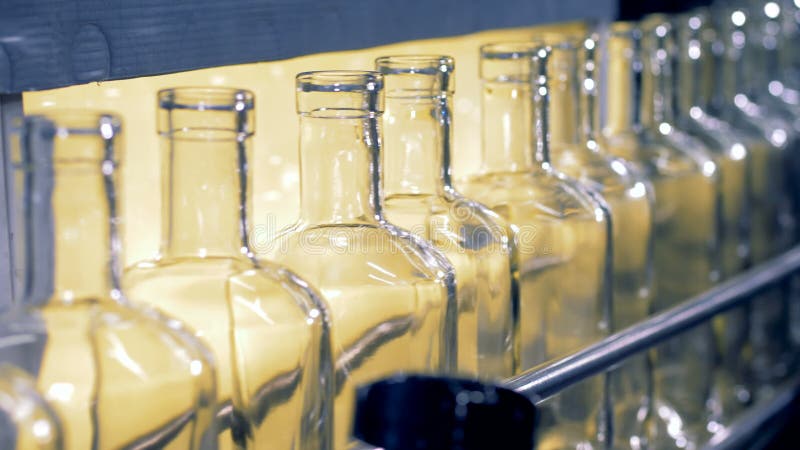 Bottles on an Assembly Line, Close Up. Stock Footage - Video of ...