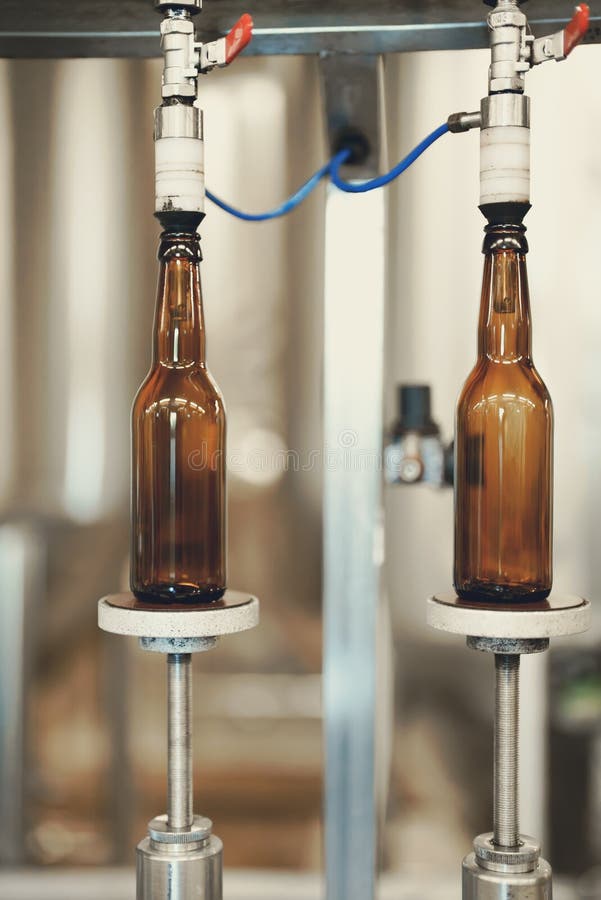 Beer Filling in a Brewery - Conveyor Belt with Glass Bottles Stock ...