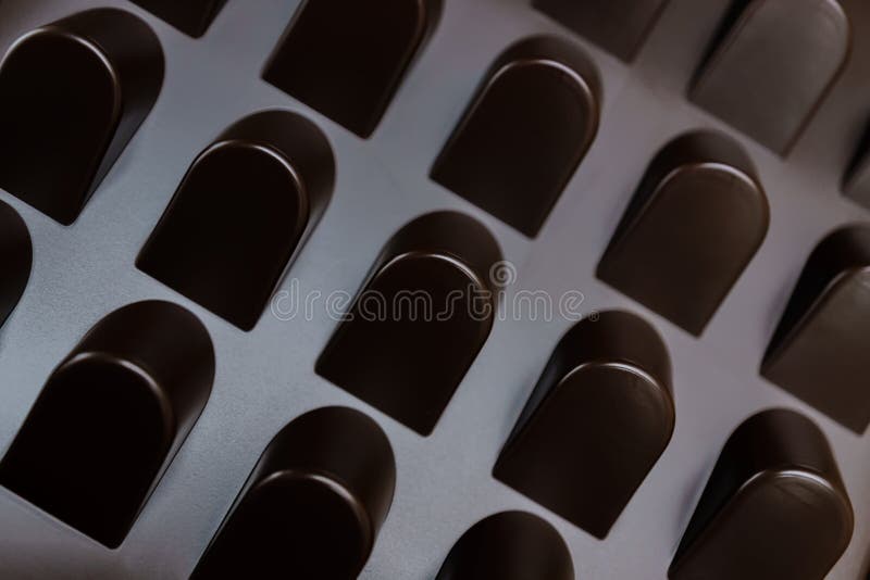Empty Box of Chocolate Shapes. Abstract Texture Background Stock Image ...