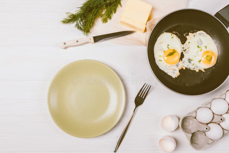 Empty Breakfast Plate with Fork among Cooking Ingredients Stock Photo ...