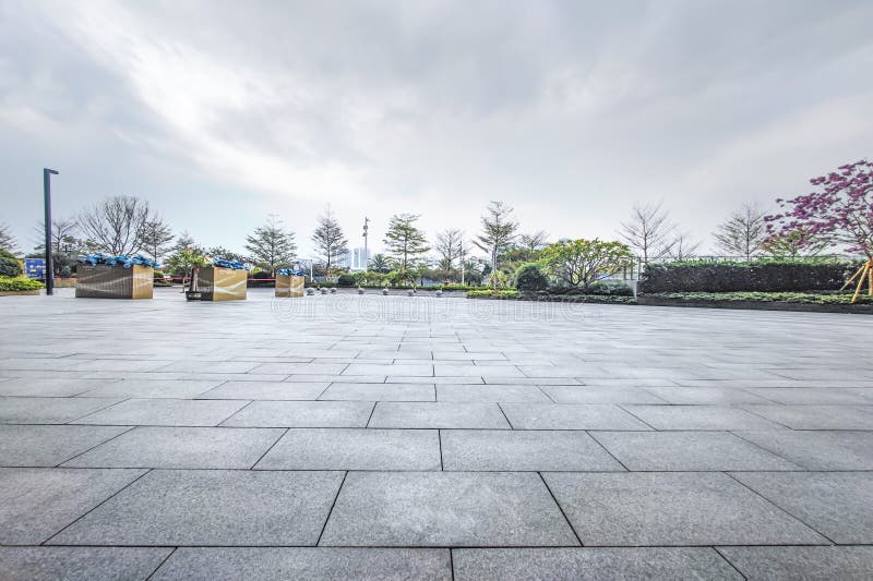 Empty Brick Floor and Modern Building in City Park with Green Tree ...