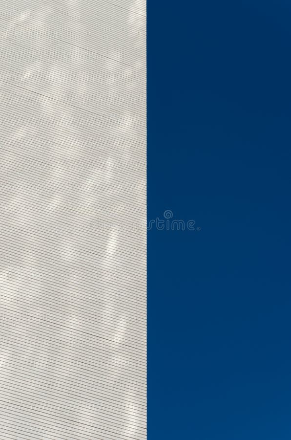 A Row of Modern High-rise Buildings Against a Clear Blue Sky in ...