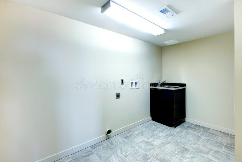 Empty bright laundry room stock photo. Image of estate - 37476906