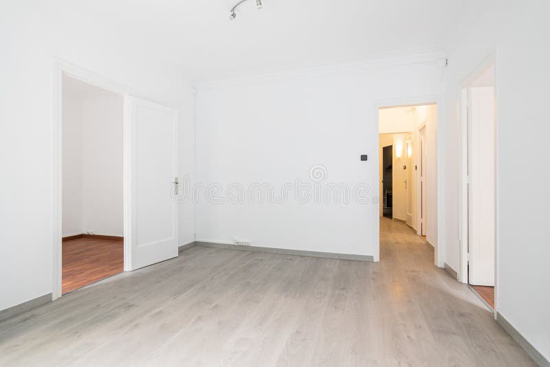 Empty Bright Spacious Walk-through Room with Open Doors and a View of ...