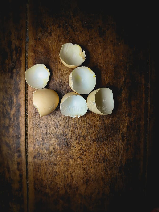 An Empty Broken Chicken Egg Shell without Its Contents on an Old Wooden ...