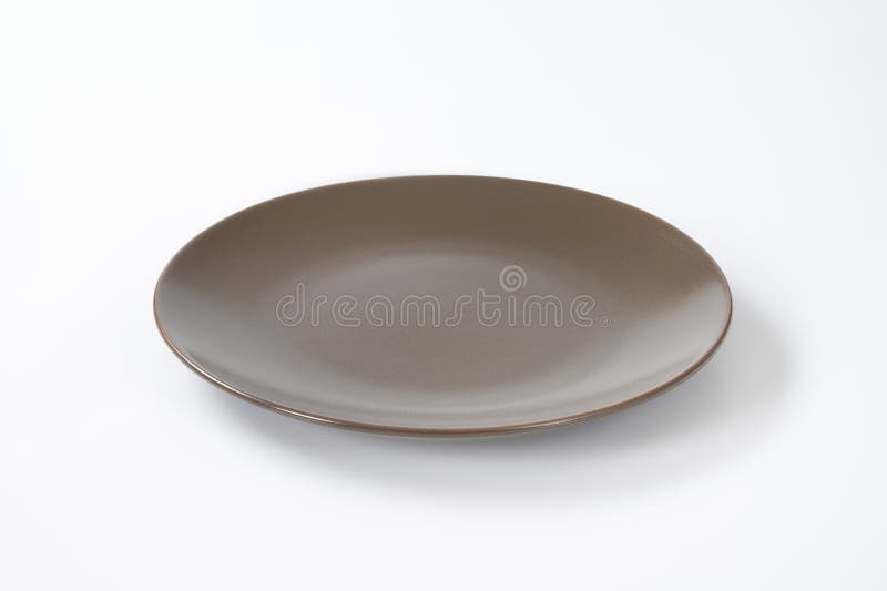 Empty brown plate stock photo. Image of empty, plain - 73797758