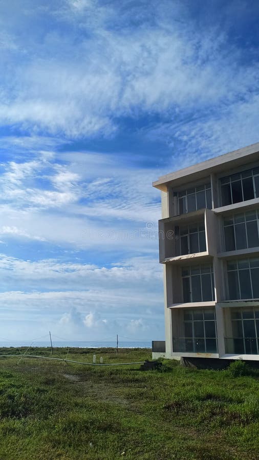 Empty Buildings on the Beach Side with View the Blue Sky and Green ...