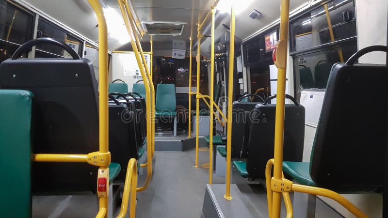 An Empty Bus is Equipped with Handrails for Holding it on the Inside ...