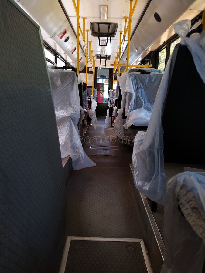 Empty Bus during Pandemic Inside View with Plastic Bags on Seats Stock ...