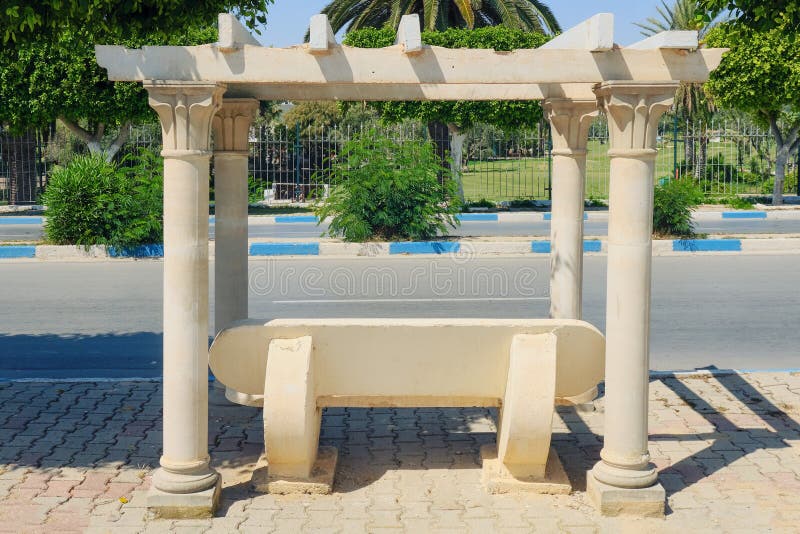 Empty Bus Stop with Columns in the Style of Ancient Rome or Greece in ...