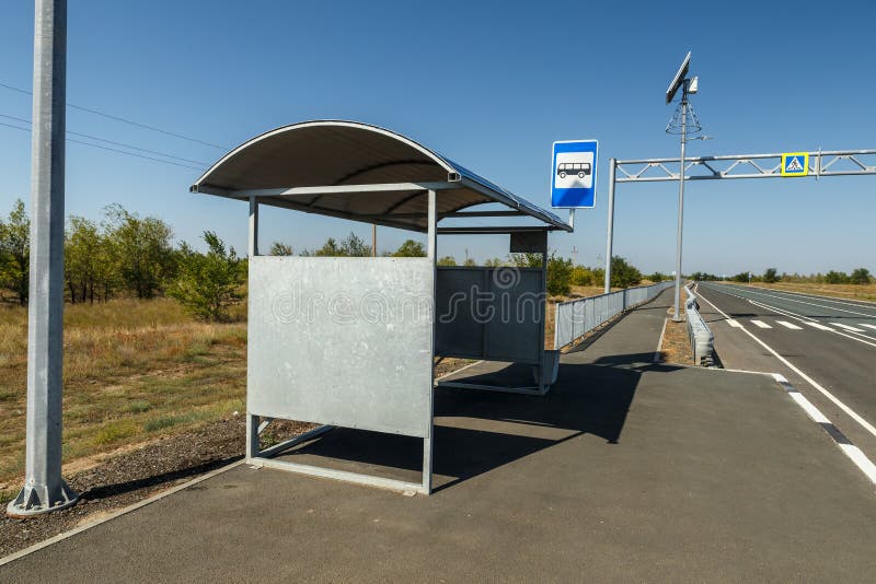 Empty bus stop on the road stock image. Image of commercial - 168831395