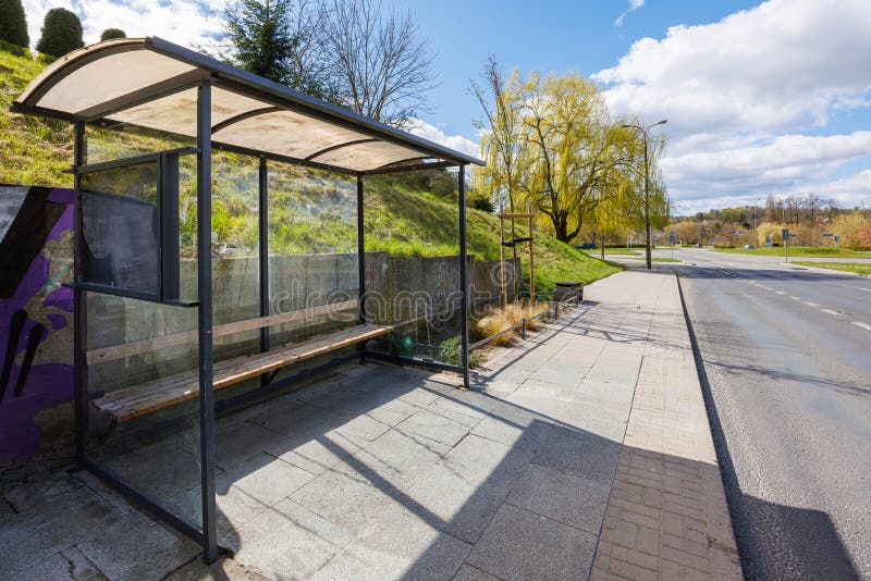 An Empty Bus Stop on the Side of the Road on a Spring Day. Covered Bus ...
