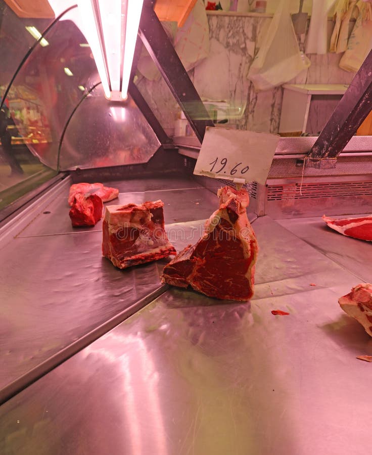 Almost Empty Butcher Counter with Few Pieces of Red Meat for Sale Stock ...