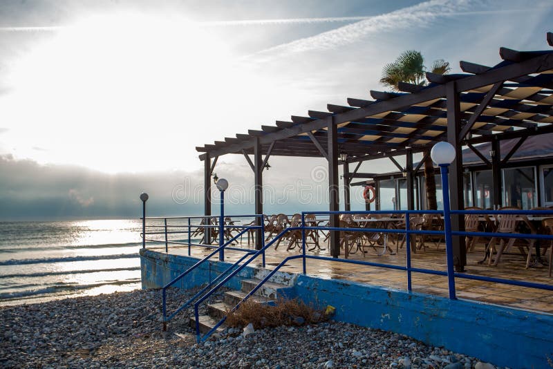 Cafe at beach in sunset stock photo. Image of summer - 177854740