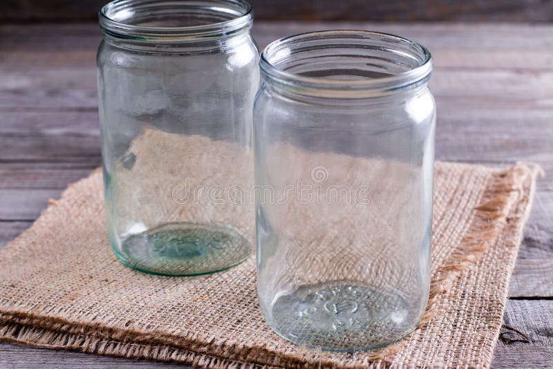 Empty Canning Jars Await Use on a Wooden Table Stock Image - Image of ...