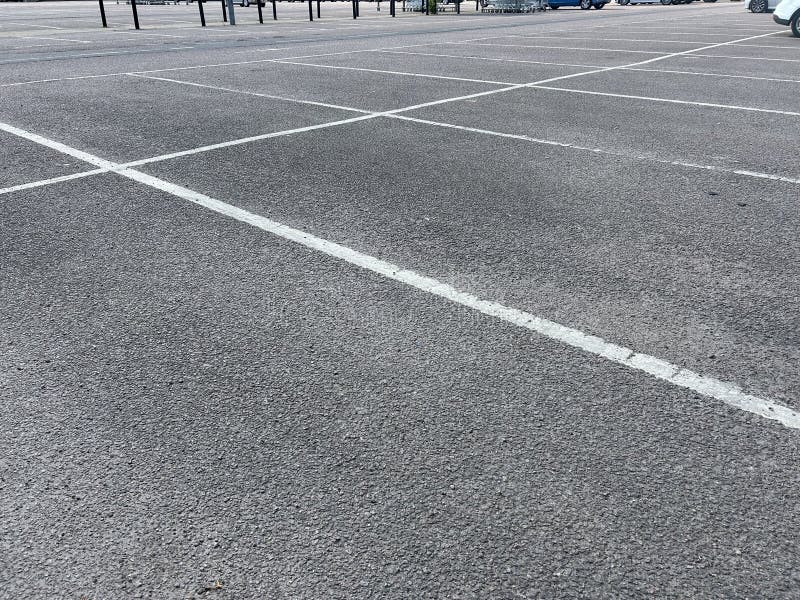 Empty Car Parking Spaces with White Lines Stock Photo - Image of road ...