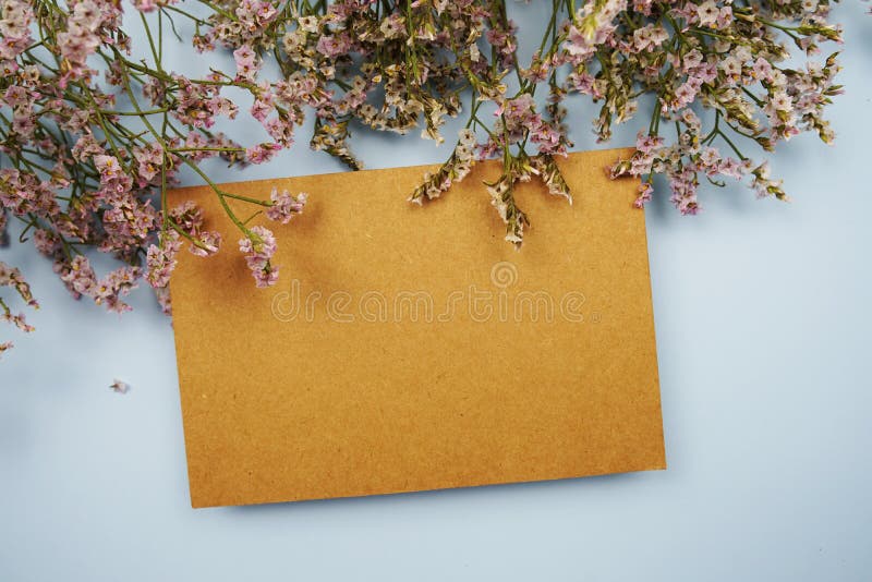 Empty Card for Text Message and Flower Decoration on Blue Background ...
