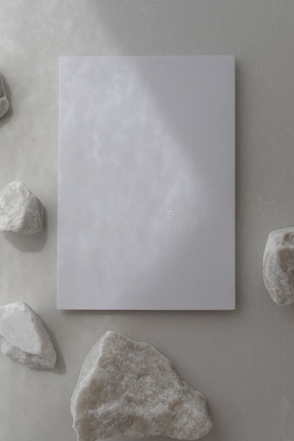 Empty Card with White Decorated Stones and Sunlight Shadows on Neutral ...