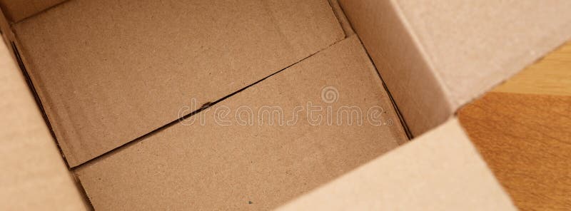 Empty Cardboard Box a Wooden Floor. Stock Photo - Image of unboxing ...