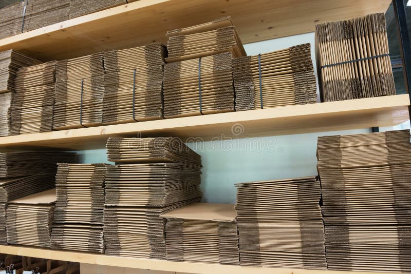 Empty Cardboard Boxes in Warehouse Stock Photo - Image of material ...