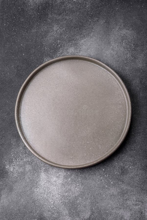 Empty Ceramic Round Plate on Dark Textured Concrete Background Stock ...