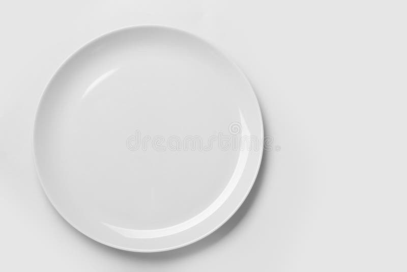 Empty Ceramic Plate on White Background, Top View. Space for Text Stock ...