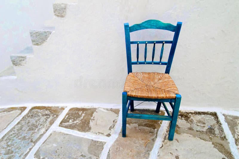 Typical blue Greek chair stock image. Image of seat, wall - 13564419