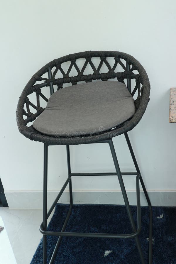 1 Empty Chair, Beautiful Modern Design, Made of Steel and Rattan. Stock ...