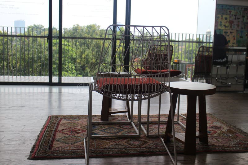 Empty chair and stool stock image. Image of furniture - 251141571