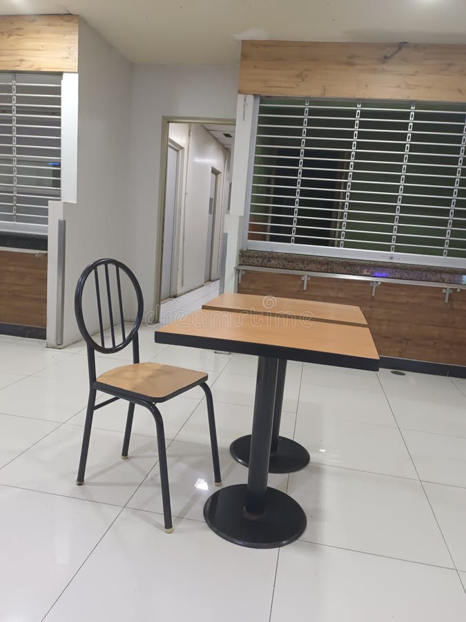 Empty Chair and Table beside Closed Cafe Stock Photo - Image of wood ...