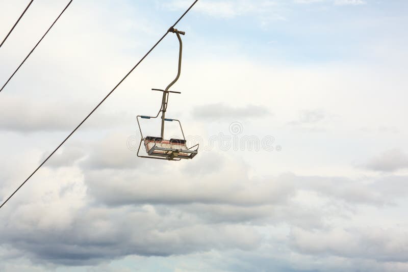 Empty Chairlift with Cloudy Sky in the Background Stock Photo - Image ...