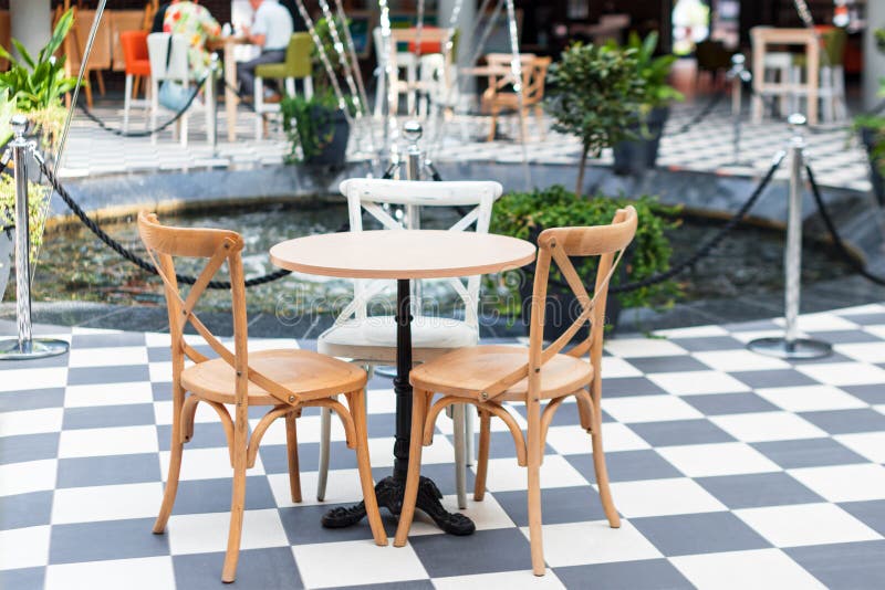 Empty Chairs in Cafe or Restaurant Near Fountain Stock Photo - Image of ...