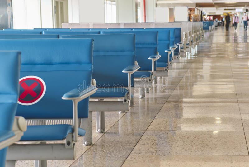 Empty Chairs in the Departure Hall at Airport, Blurred Plane on a ...