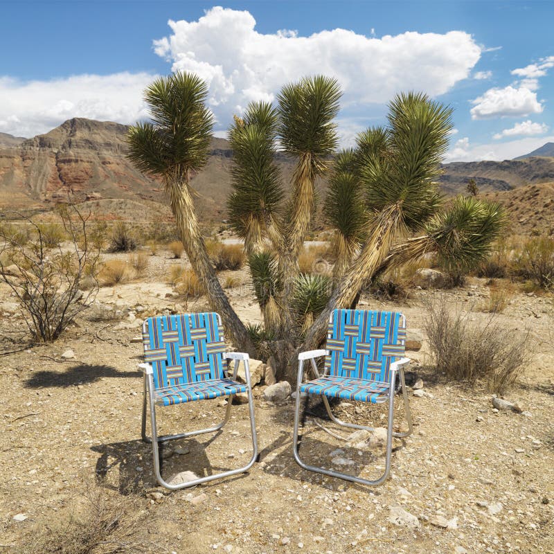 Lawn chairs in desert. stock image. Image of furniture - 4487937