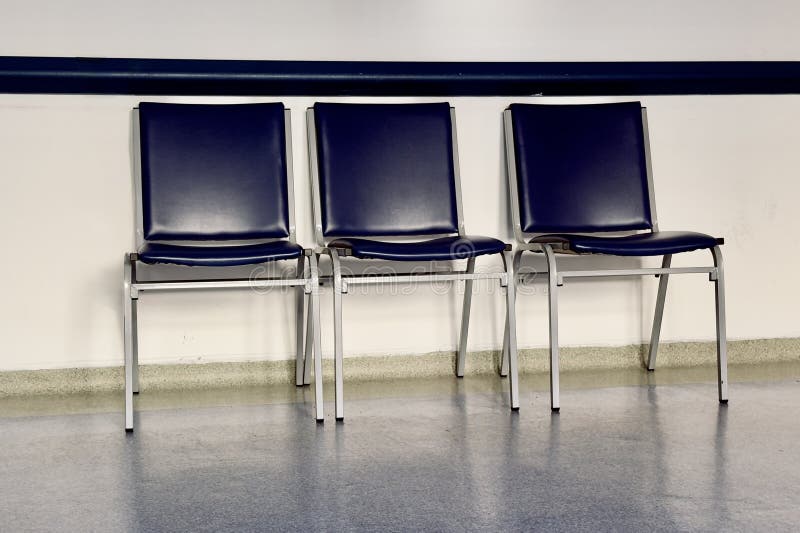 Empty Chairs in a Hospital Waiting Room. Stock Photo - Image of ...