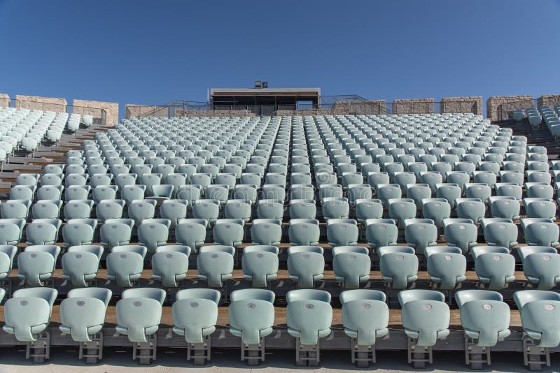 Empty Chairs in Stadium stock photo. Image of bench - 171588234