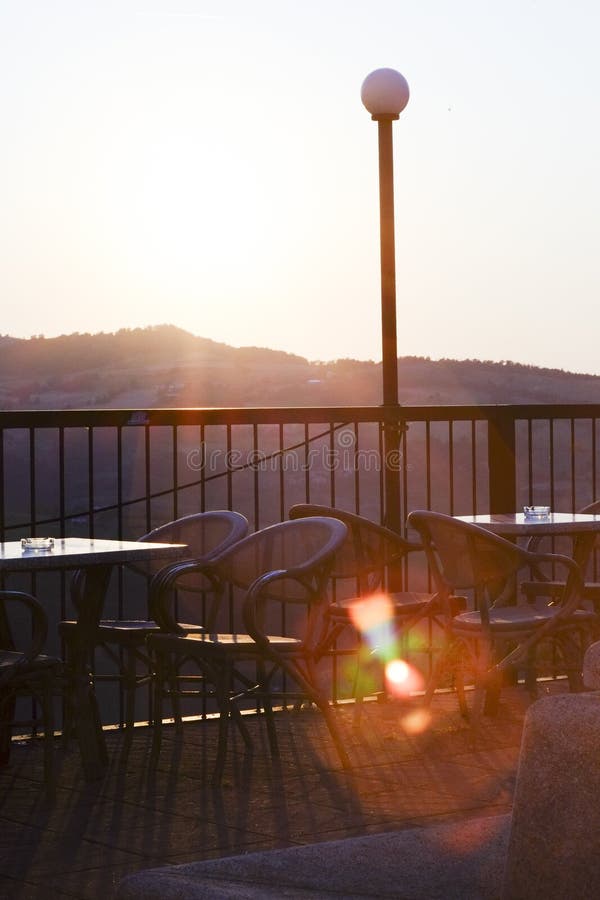 Empty Chairs Waiting for Customers at Sunset in Italian Restaurant ...